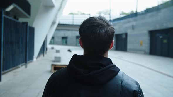 Back View of Man Walking on Urban Street. Man Going on City Street ...