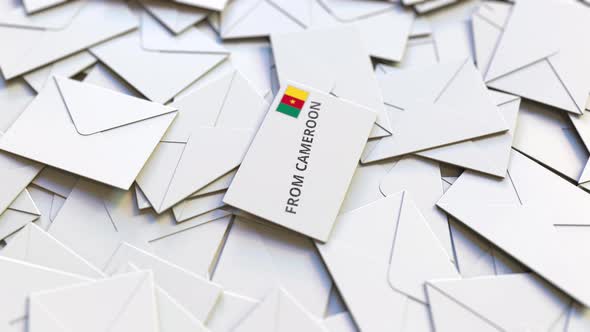 Letter with From Cameroon Text on Pile of Other Letters, Motion Graphics