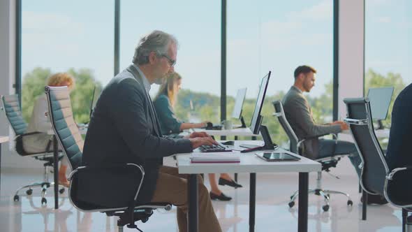 Overworked man collapsed on office desk, Stock Footage | VideoHive