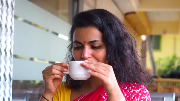 Indian Woman Drinking Masala Tea with Milk and Spices She Wearing Gold ...