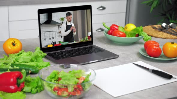 Laptop Computer with Man Food Blogger Shows Slice Cucumber Tells ...