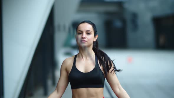 Fitness Girl Jumping on Skipping Rope. Sexy Woman Training on Outdoor ...