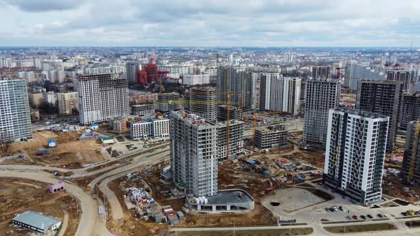 Flying over the construction site of a huge residential block of ...
