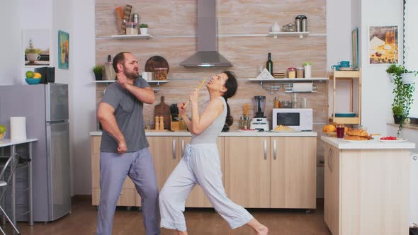 Funny Couple Dancing in Kitchen, Stock Footage | VideoHive