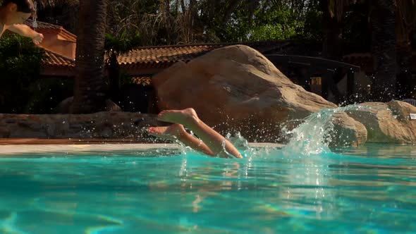Children Dive Into the Pool One After Another, Stock Footage | VideoHive