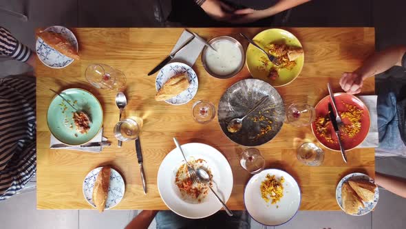 Top View of a Group of Friends Enjoying Dinner at the Restaurant, Stock ...