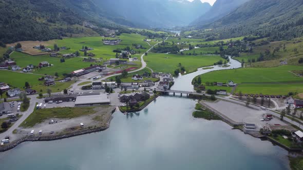 Olden town centre with misty Oldedalen valley in background - Reverse ...