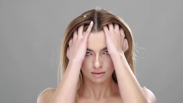 Girl Seperates Hair To the Sides and Angry Looking on Camera, Stock Footage