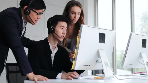 Call center support team discussion together before start working ...