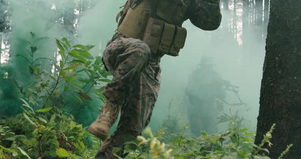 Soldiers Running Millitary Action in Dense Forest with Smoke in ...