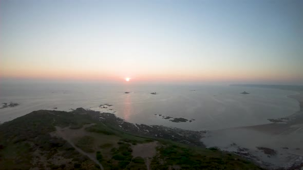 Drone aerial footage of the rocky cliffs of Beauport Beach in Jersey ...