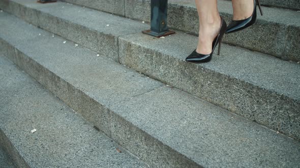 Closeup Female Feet Going Downstairs in Shoes. Woman Walking in High ...
