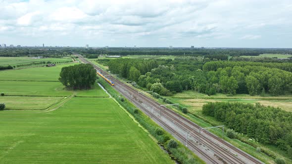 Dutch Moving Commercial Train in Nature Forrest Landscape, Stock Footage