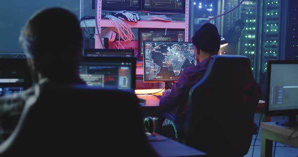 Hacker Team Working in a Basement, Stock Footage | VideoHive