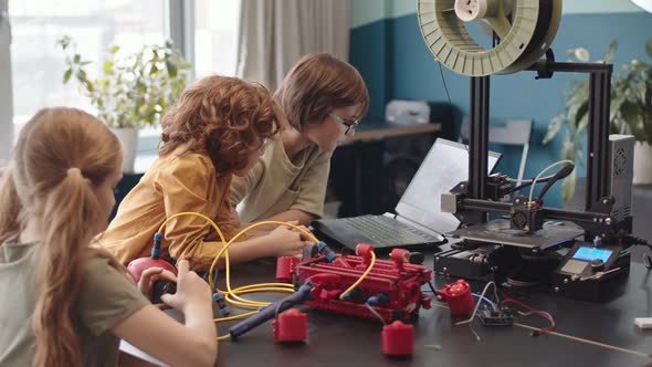 Schoolchildren Programming Robot Using Laptop, Stock Footage | VideoHive