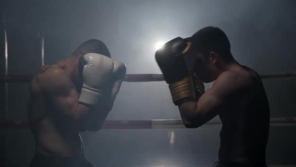 Cinematic Slow Motion Shot of Two Professional Young Muscular Shirtless ...