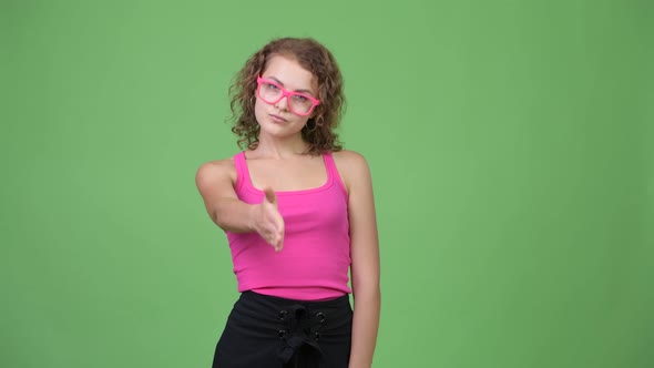 Young Beautiful Nerd Woman Giving Handshake, Stock Footage | VideoHive