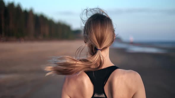 Athletic Blonde Woman with Waving Hair Running Jogging Cardio Training ...