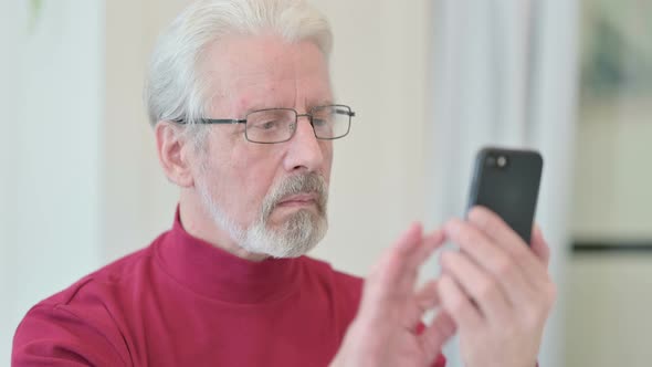Close Up of Old Man Using Smartphone, Stock Footage | VideoHive