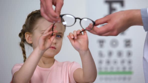 Upset Little Girl Rejecting Glasses, Child Feels Insecure in Eyewear ...