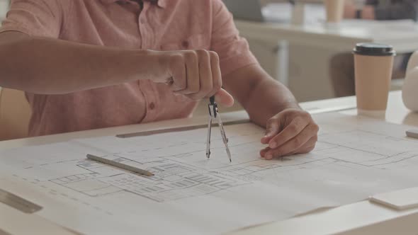 Architect with Compass Drawing Building Plan, Stock Footage | VideoHive