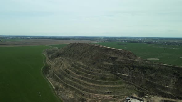 Conserved landfill for household waste. A mound of rubbish. Aerial ...