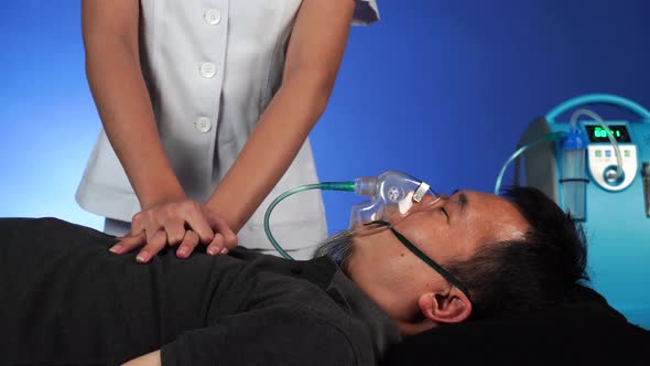 Nurse use hand pump on chest for first aid emergency CPR on heart ...