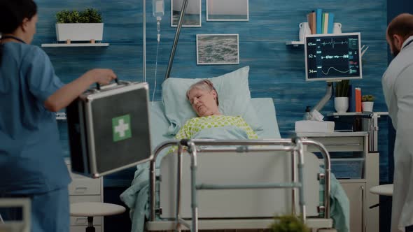 Doctor and Nurse Rushing to Help Sick Patient with Resuscitation, Stock ...