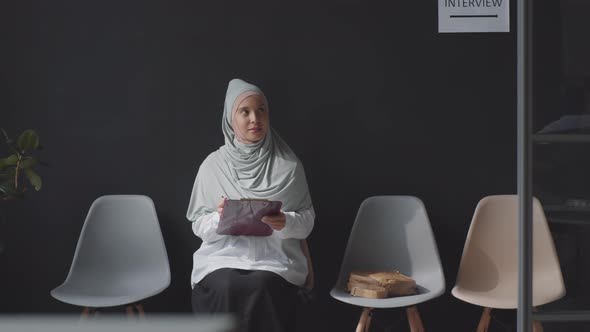 Muslim Female Candidate in Hijab Waiting for Job Interview, Stock Footage