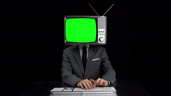 Man Typing TV Head Showing Green Screen Screen, Stock Footage | VideoHive