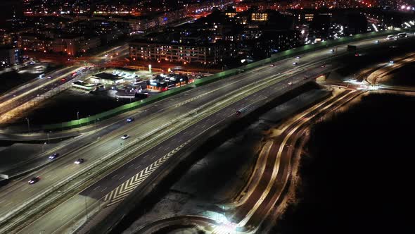 Top down night city roads with cars driving aerial view. Nightly urban ...