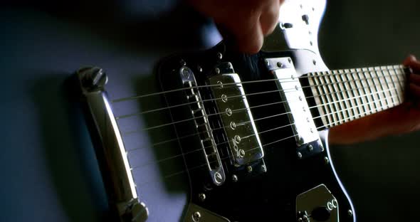 Male Guitarist Plug in Electric Guitar, Stock Footage | VideoHive