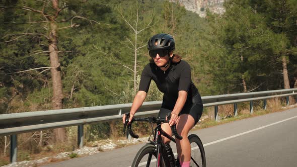 Triathlete training triathlon on road bicycle, Stock Footage | VideoHive