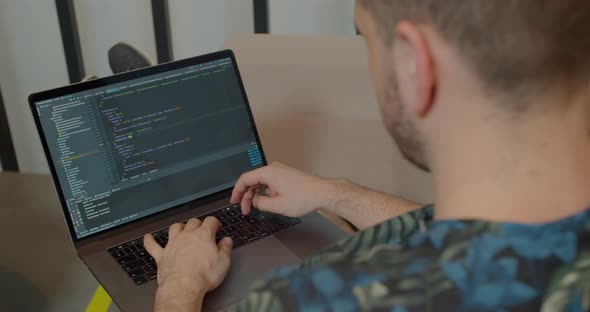 Close Up Man Coding Html and Programming on Screen Monitors ...