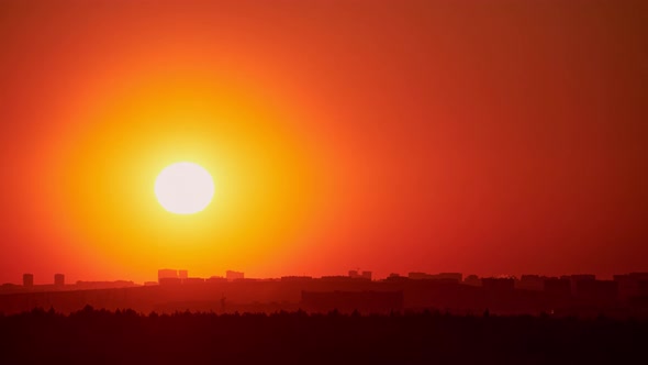 The morning sun rising above the horizon, the landscape at dawn. Summer ...