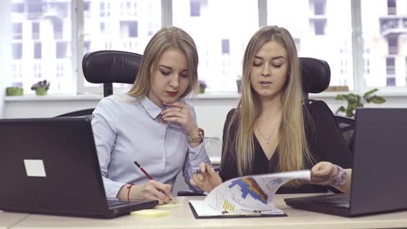 Business Girls Work with Charts, Stock Footage | VideoHive