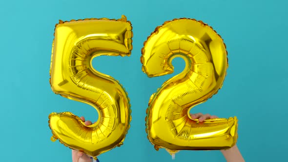Gold Foil Number 52 Celebration Balloon, Stock Footage | VideoHive