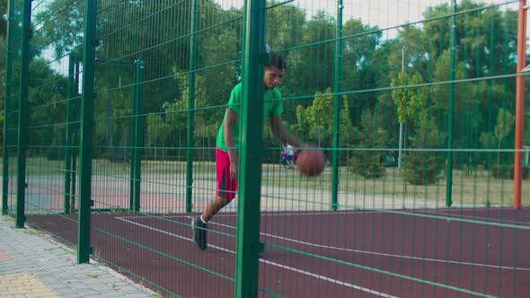 Serious Streetball Player Dribbling Ball on Court, Stock Footage ...