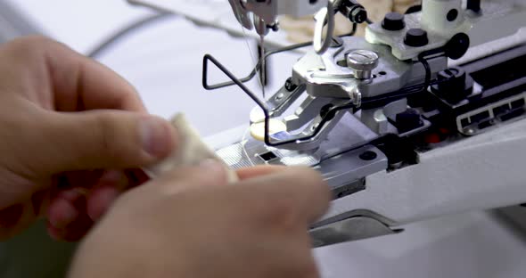 Tailor sewing button on electric sewing machine, Stock Footage | VideoHive