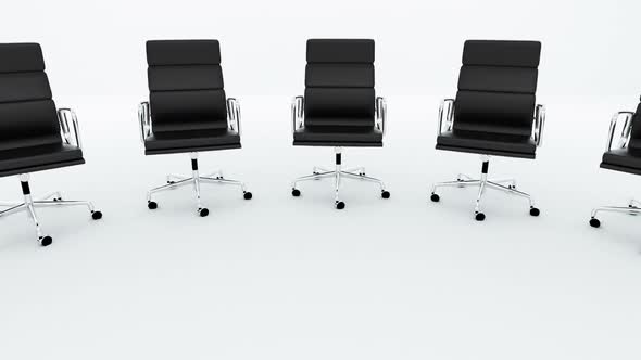 Seamless rotary animation with black office chairs stacked around ...