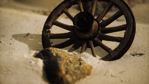 Large Wooden Wheel in the Sand, Motion Graphics | VideoHive