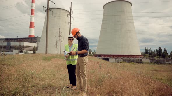 Engineers Power Lines. Enginer Hard Hat Power Plane. High Voltage Pilon.Transmission Energy ...