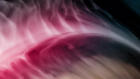Dark pink paint and watercolor ink flowing in slow motion abstract ...