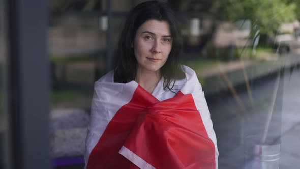 Happy Woman Wrapping in Canadian Flag Looking at Camera Smiling ...