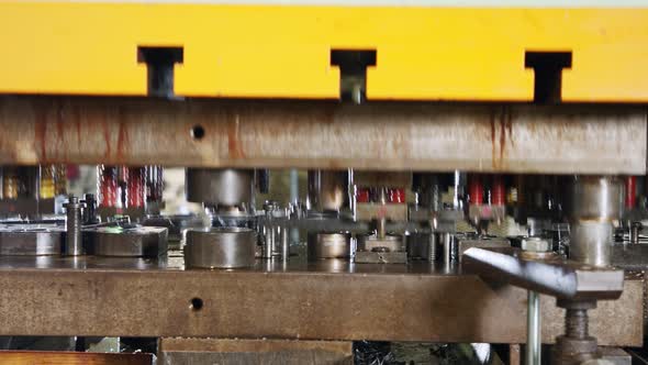 A large industrial punch press forming sheet metal parts, Stock Footage