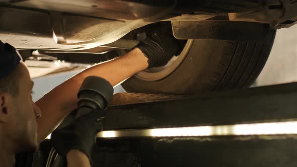 Car suspension test at automobile service. Inspection of the ...