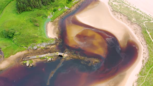 Aerial of the Mouth of the Fintragh River at Fintra Beach By Killybegs ...