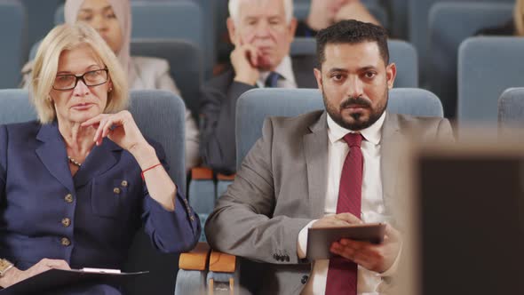 Politicians Listening to Speaker at Political Forum, Stock Footage