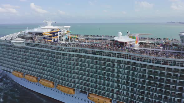 Aerial Top View of Sailing Cruise Ship. Passengers Having Fun on Upper ...