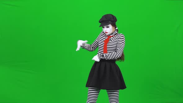 Mime Girl Is Hardly Pulling a Rope, Smiling, Stock Footage | VideoHive